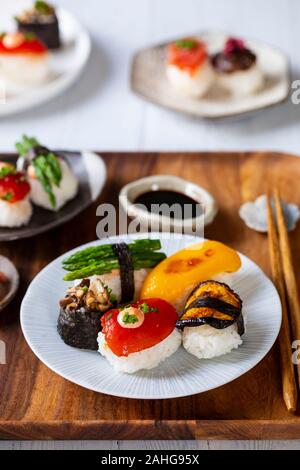 Vegan sushi with tomato, mushroom and asparagus Stock Photo - Alamy