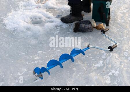 Winter fishing, ice fishing. Vladivostok, Russia Stock Photo - Alamy
