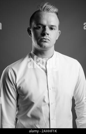 Portrait of businessman with Mohawk hairstyle and blond hair Stock ...