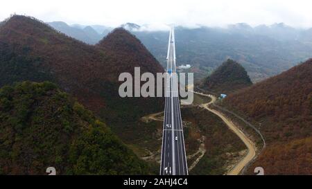Pingtang, China. 30th Dec, 2019. Aerial photo taken on Dec. 30, 2019 ...