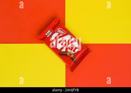 NY, USA - DECEMBER 4, 2019: Kit Kat chocolate bars in red wrapping lies ...