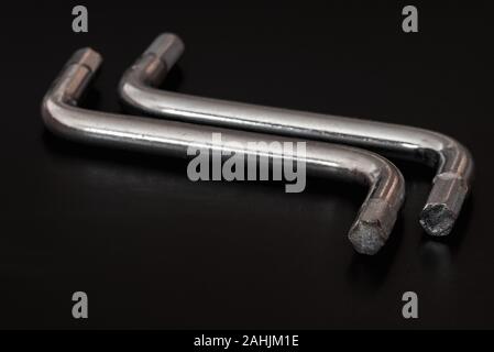 L shaped hex key or allen key tool used to drive bolts and screws with ...