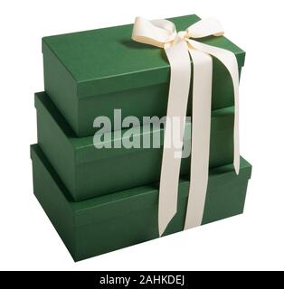 Three present boxes with red bow, christmas balls and snow fir-tree on ...