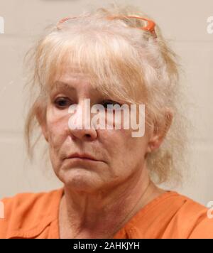 Racine, Wisconsin, USA. 30th Dec, 2019. LINDA LAROCHE, 64, talks with ...