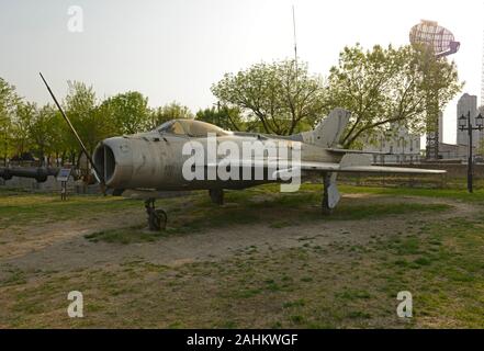 An old Chinese fighter jet from the 1950s, looking similar to a Mig 15 ...