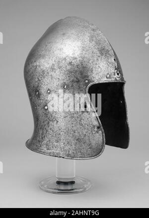 This 15th-century Italian barbute helmet has a hinged nasal guard and ...