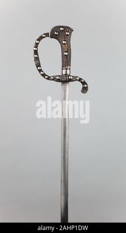 A German hunting sword, 17th century. Long single-edged blade with ...