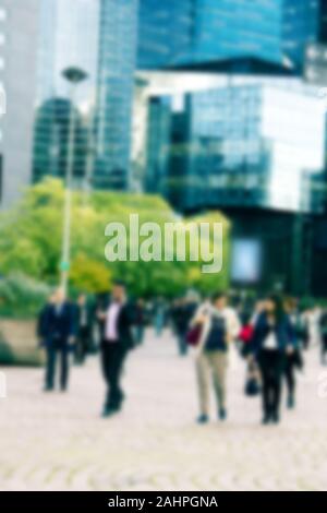People are strong blurred anonymous. Business quarter with bulk of ...