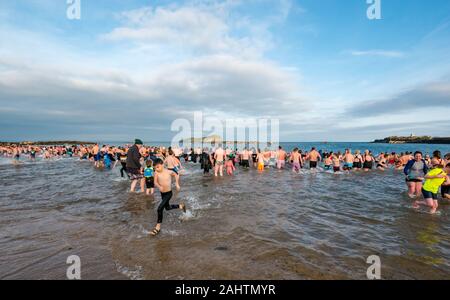 Crowd of People Running out of Water at Beach, on-set of the Film Stock ...