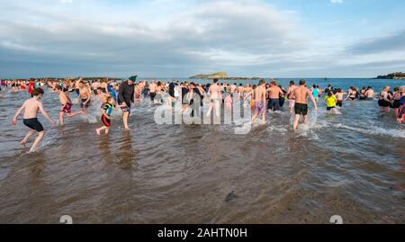 Crowd of People Running out of Water at Beach, on-set of the Film Stock ...