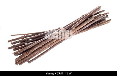 Close up of twigs tied with string Stock Photo - Alamy