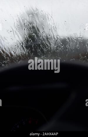 View from a car dashboard a rainy day Stock Photo - Alamy