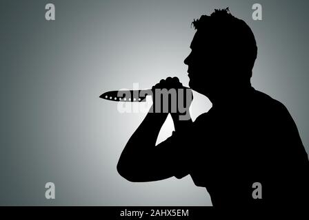 Shadow in the form of hands with a knife on a white background Stock ...