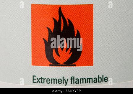 Hazard warning label on bottle of bleach sodium hypochlorite hydroxide ...