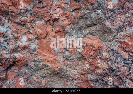 Close up on a Pegmatite rock with interlocking crystals in Poland Stock ...