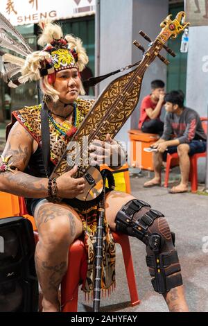 Bidayuh man in traditional clothing Stock Photo - Alamy