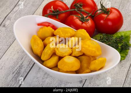 Tasty marinated patisson in the bowl Stock Photo - Alamy