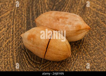 Ripe tasty Two whole pecan nuts Stock Photo - Alamy