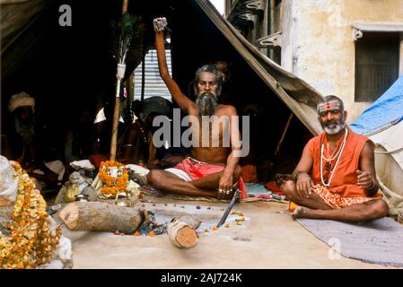 Sadhu practicing the Amar Bharti Tapa, raising his arm for 12 or more ...