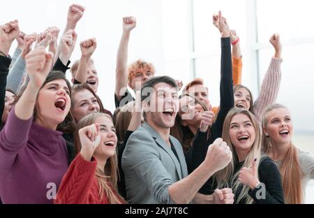 close up. a jubilant group of cheerful young people. isolated on white ...
