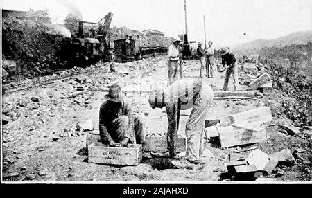 Drilling holes for dynamite blasting Stock Photo - Alamy