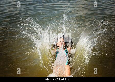 Young Active Happy Girl Jumping in The Air Isolated on White Background ...
