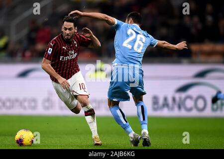 Hakan Calhanoglu of AC Milan , Stefan de Vrij of FC Internazionale ...
