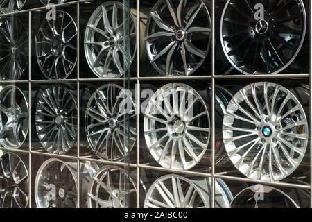 Car rims in shopping window display Stock Photo - Alamy