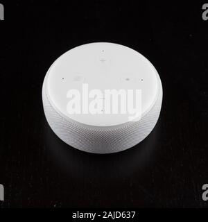 white digital voice assistant on light blue background Stock Photo - Alamy