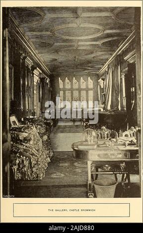 Pictures hung on the walls and other decor inside an alcove of a ...