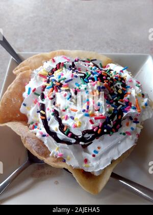 Three ice cream covered with creamy chocolate Stock Photo - Alamy