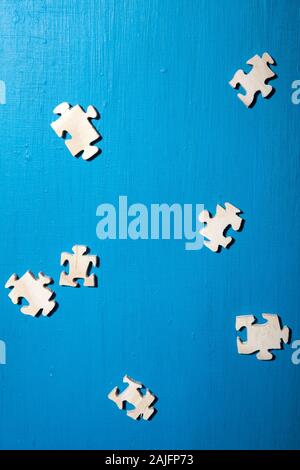 Scattered jigsaw pieces Stock Photo - Alamy