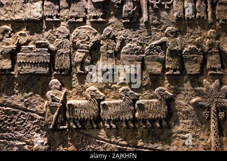 Ancient Sumerian pictographs etched into a wall at the Milwaukee Public ...