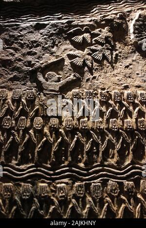 Ancient Sumerian pictographs etched into a wall at the Milwaukee Public ...