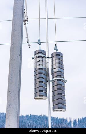 Concrete counterweights hanging from a pulley system in railroad's ...