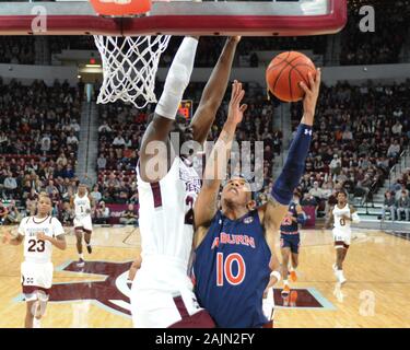 Auburn guard Samir Doughty tries to get through the defense of Georgia ...