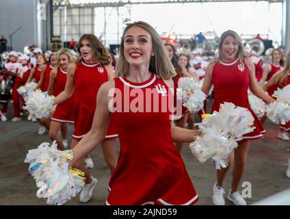 Florida dancers perform on the field during the second half of an NCAA ...