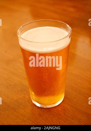 Pint of cold lager beer served outdoor in sunny beach bar on Cyprus ...