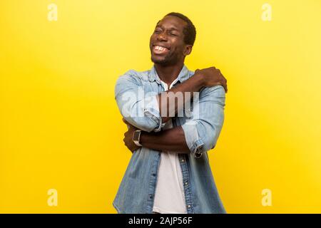I love myself. Portrait of pleased satisfied young african american ...