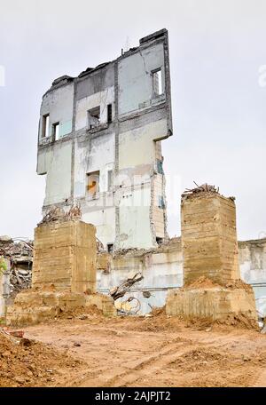 The remains of concrete walls of the building after the explosion Stock ...