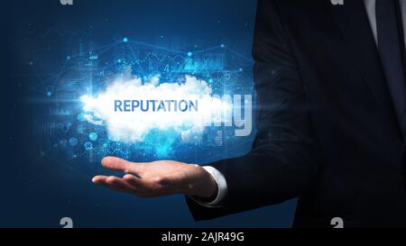 Hand of Businessman holding REPUTATION inscription, successful business ...