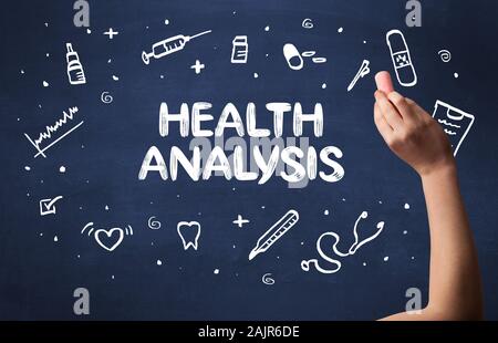 Hand drawing HEALTH ANALYSIS inscription with white chalk on blackboard ...