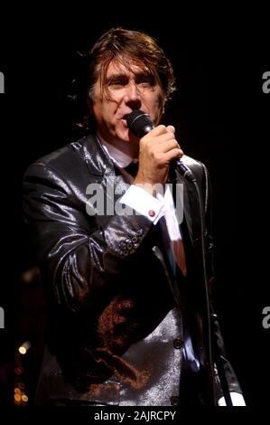 Bryan Ferry Singer with Pop Group Roxy Music singing on stage wearing ...