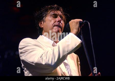 Bryan Ferry Singer with Pop Group Roxy Music singing on stage wearing ...