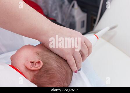CT scan of the brain of a 6 month old child showing a subdural hematoma ...