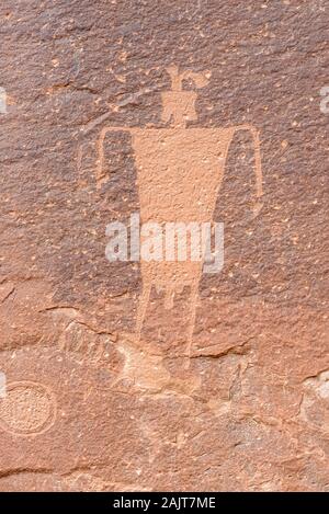 Native American petroglyph rock art is carved into the Aztec sandstone ...