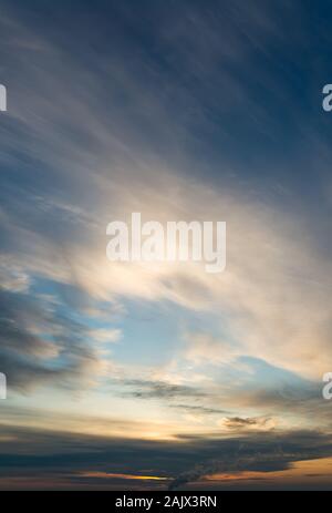 Fantastic clouds at sunrise, vertical panorama Stock Photo - Alamy