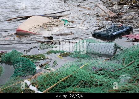 Plastic waste (fishing net) pollution on a beach in Wales UK Stock ...