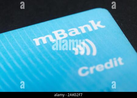 In this photo illustration a mBank logo seen on a Visa credit card ...