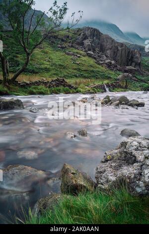 Afon Nant Peris River as it flows through Llanberis pass in Gwynedd ...